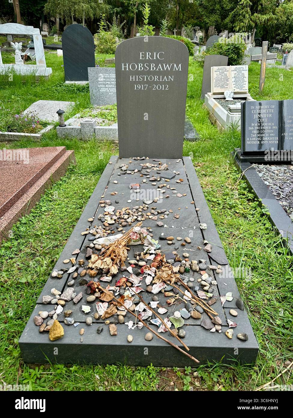 The grave of the historian Eric Hobsbawm at Highgate cemetery, London ...