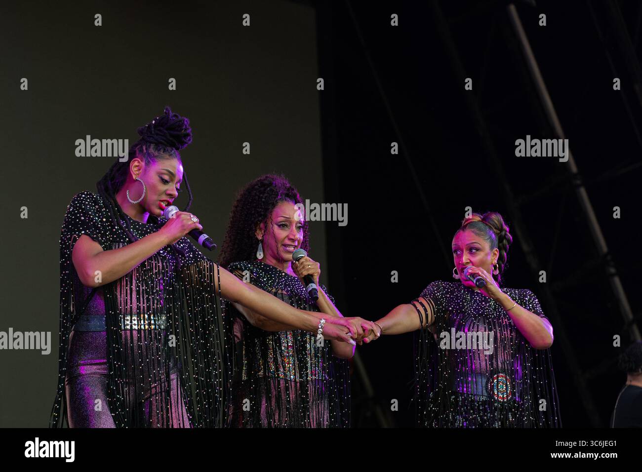 Cambridge, UK, 31 July, 2025. Sister Sledge in concert. Pictured left ...