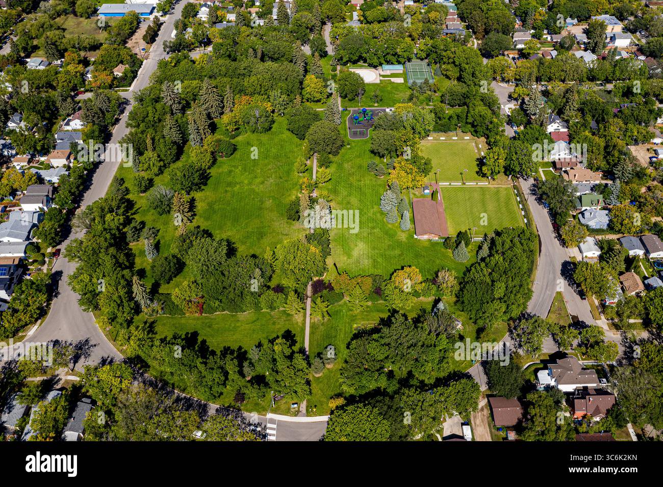 Large green park with a circular shape. The park is surrounded by ...