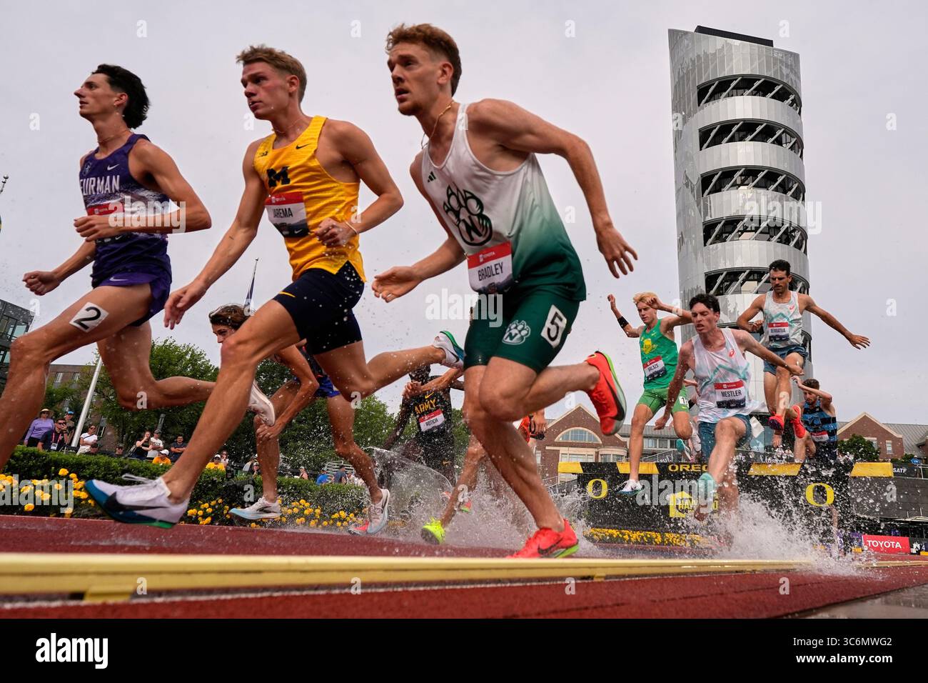 Runners compete during the first heat of the men's steeple chase during the U.S. Championships ...