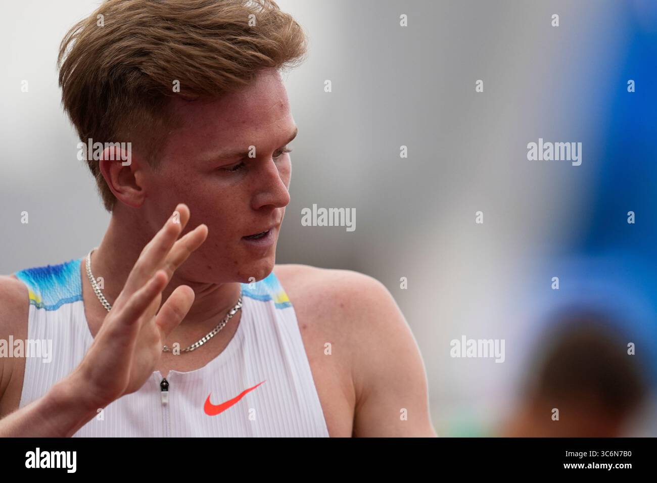 Ethan Strand gestures after winning the first heat in the first round ...