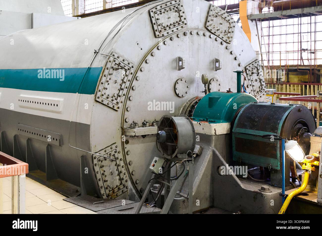 Powerful industrial steam turbine generator operating in a thermal ...