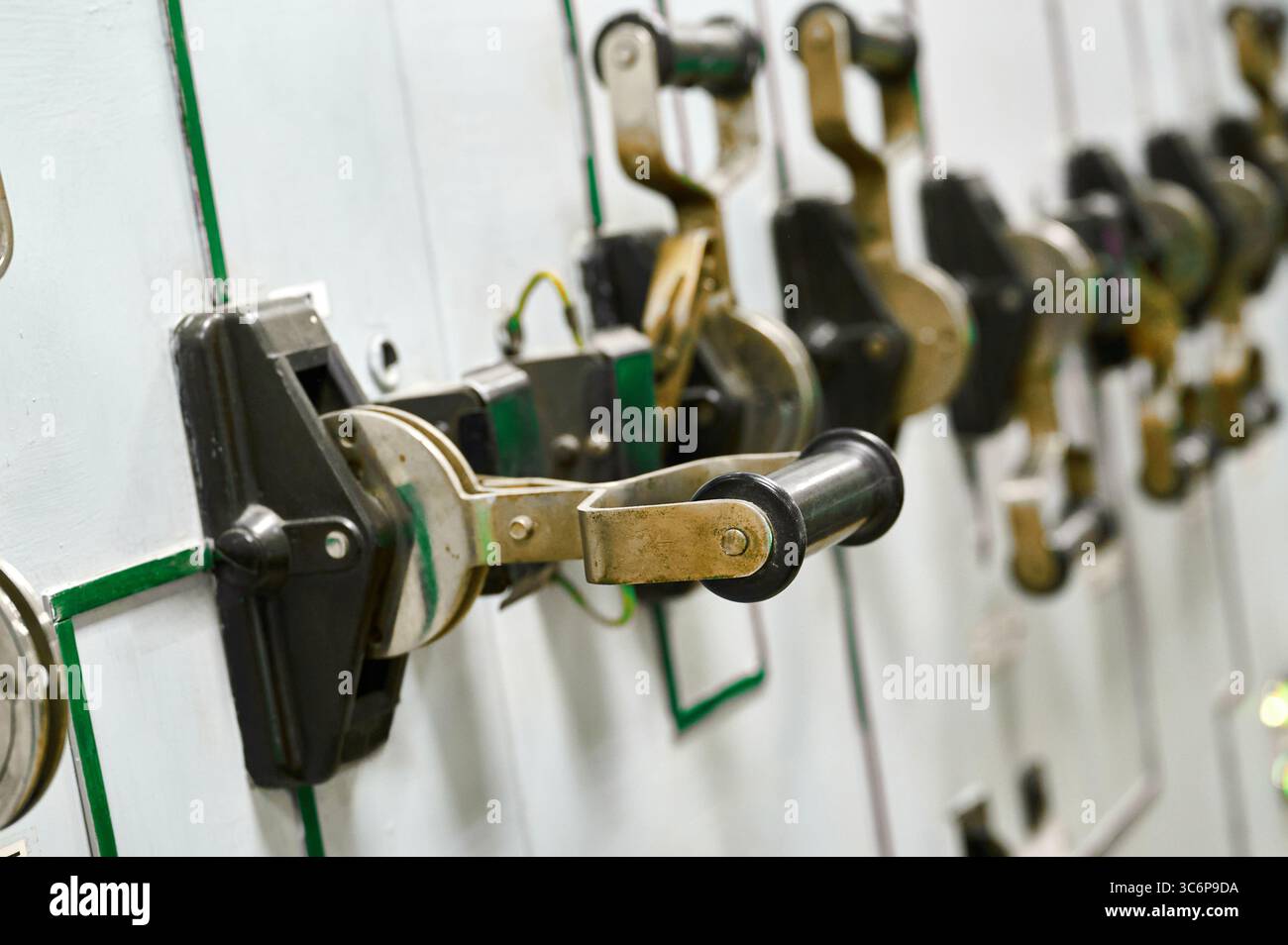 Vintage control panel with mechanical levers and switches in industrial ...