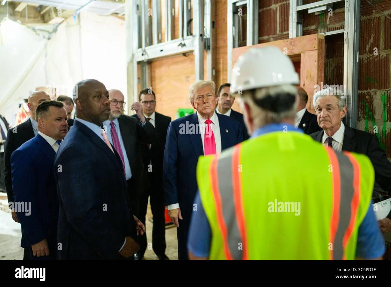 President Donald J. Trump speaks with construction workers and ...