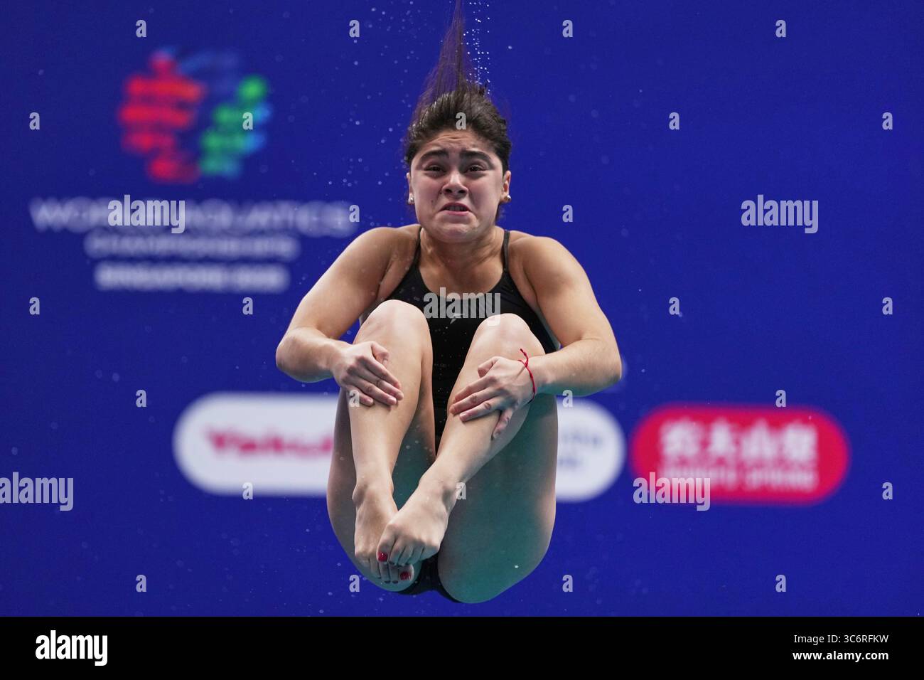 Ana Ricci of Peru competes in the women's 3m springboard diving ...