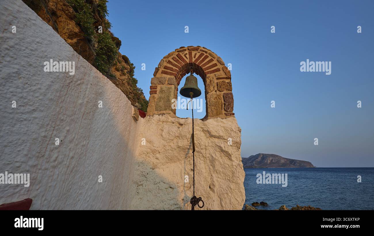 Legend, crab, shell fisherman, stone arch with bell overlooking the sea ...