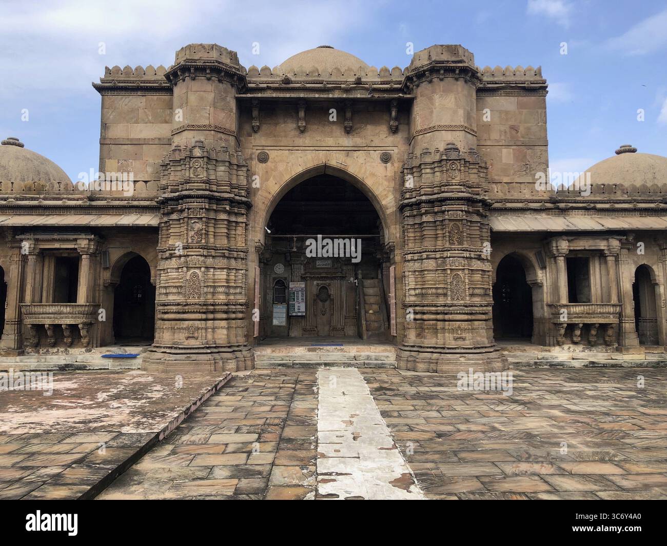 Historic building with sandstone architecture and multiple domes ...