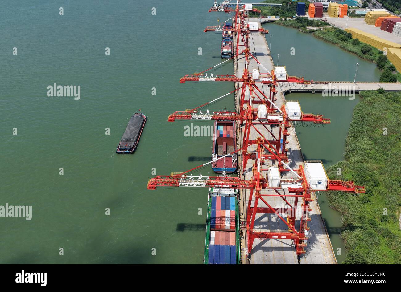 Aerial photo shows the busy container terminal at Yangzhou Port in ...