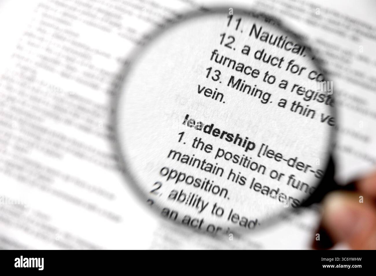 Looking at leadership word definition through magnifying glass Stock ...