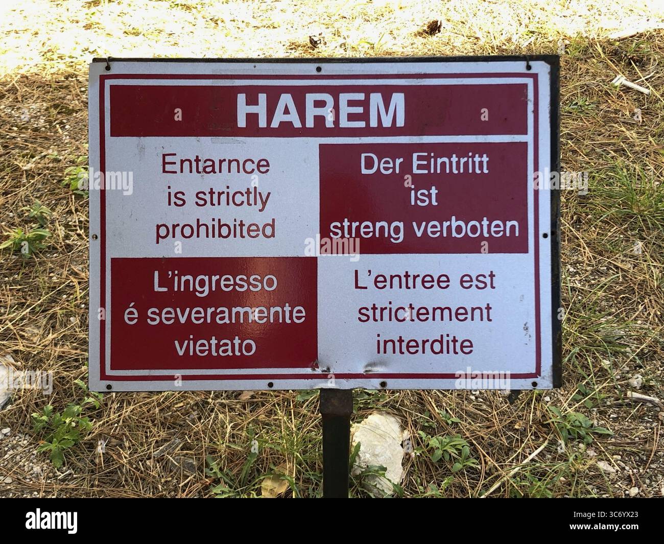 Multilingual warning sign prohibiting entry to a harem area, Mostar ...