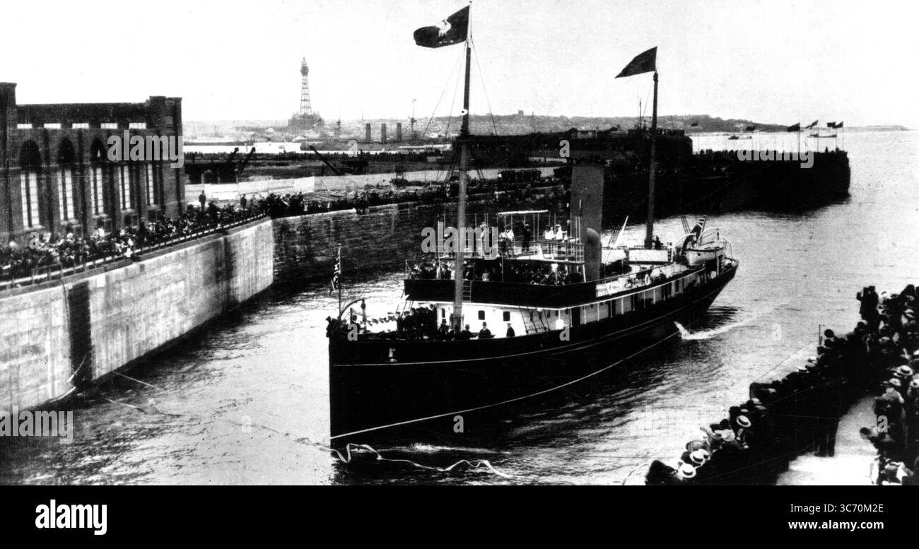 The Mersey tender Galatea , cutting the ribbon across the mouth of the ...