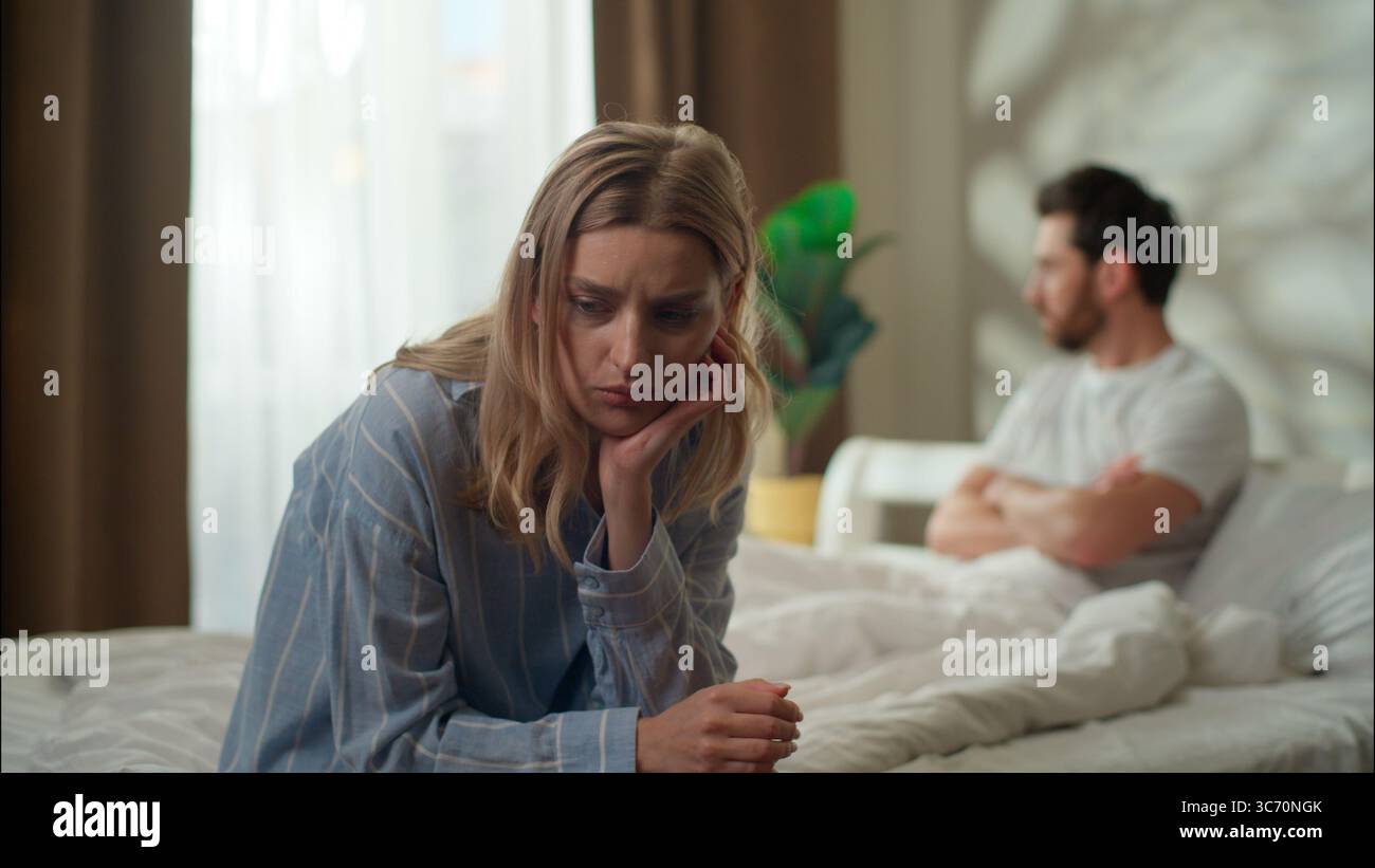 Family argument stressed Caucasian couple in bedroom divorce frustrated ...