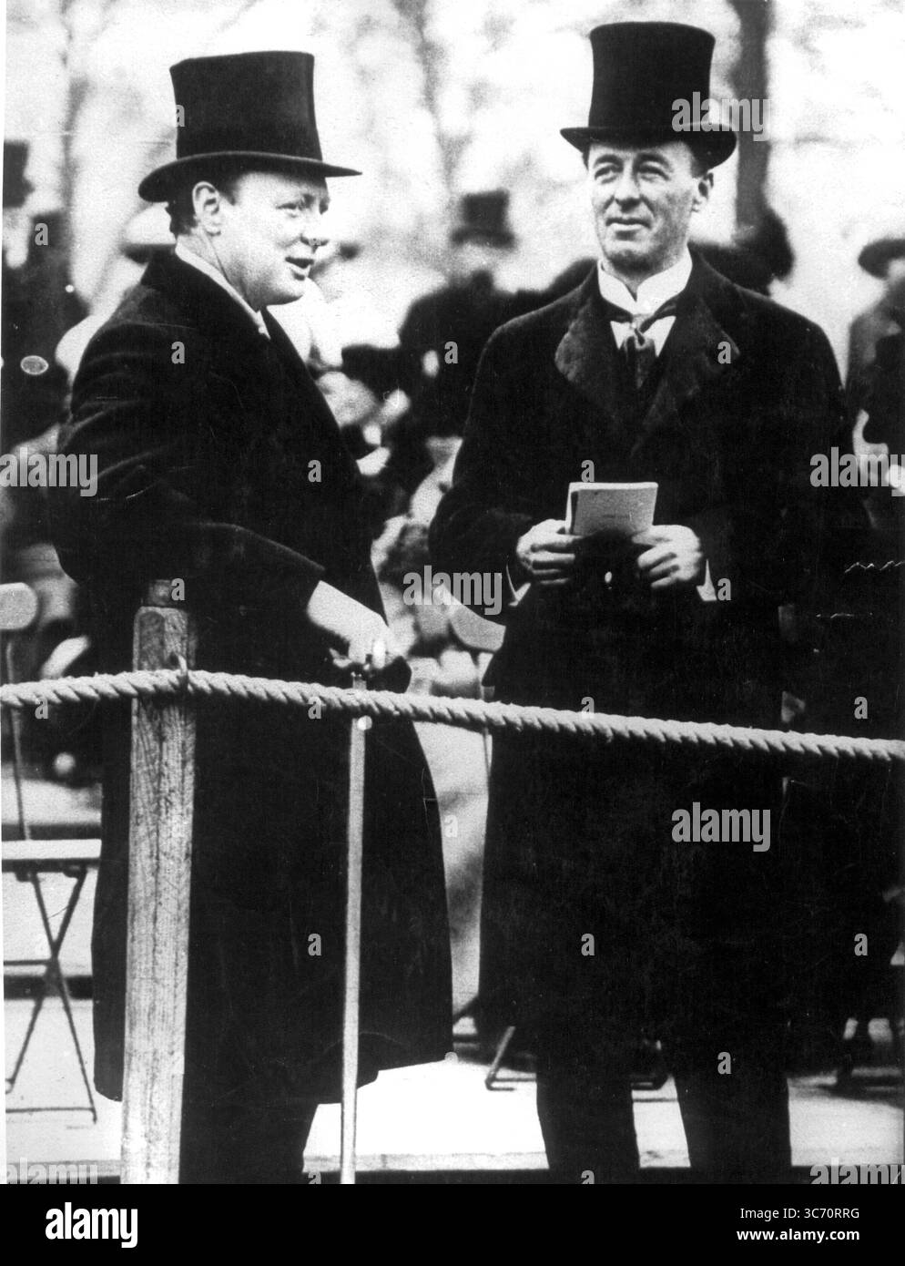 Photo shows Winston Churchill with Colonel Seely watching a review of ...