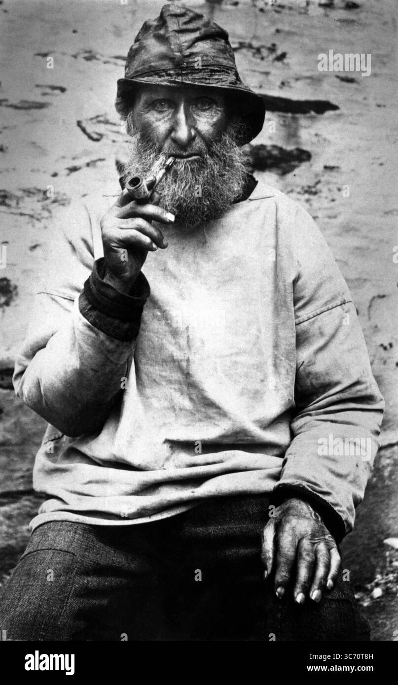 Fisherman smoking Black and White Stock Photos & Images - Alamy