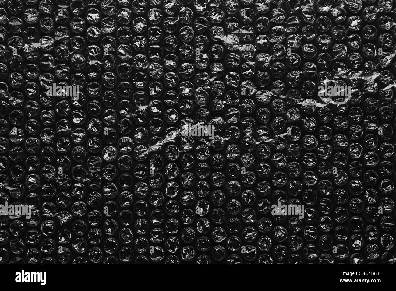Black plastic wrap background Black and White Stock Photos & Images - Alamy