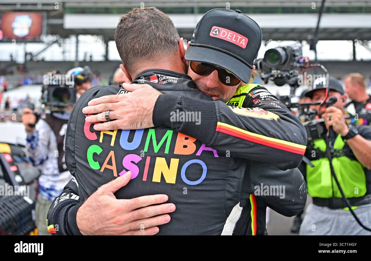 NASCAR Drivers Bubba Wallace and Ryan Blaney share a hug after Wallace ...