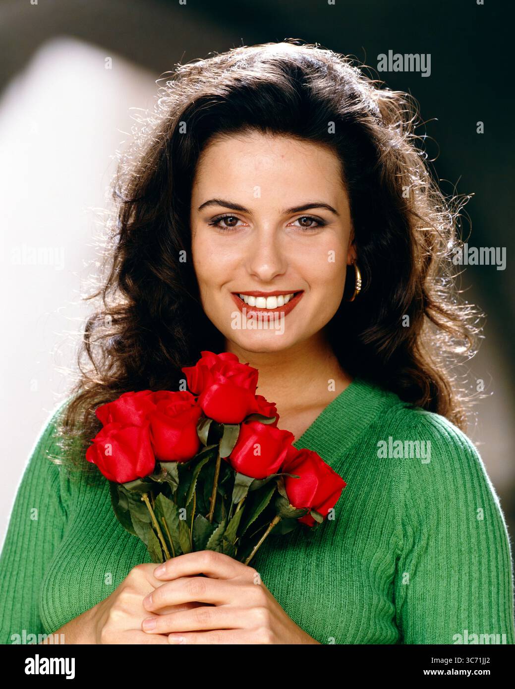 Model wearing red top hi-res stock photography and images - Alamy