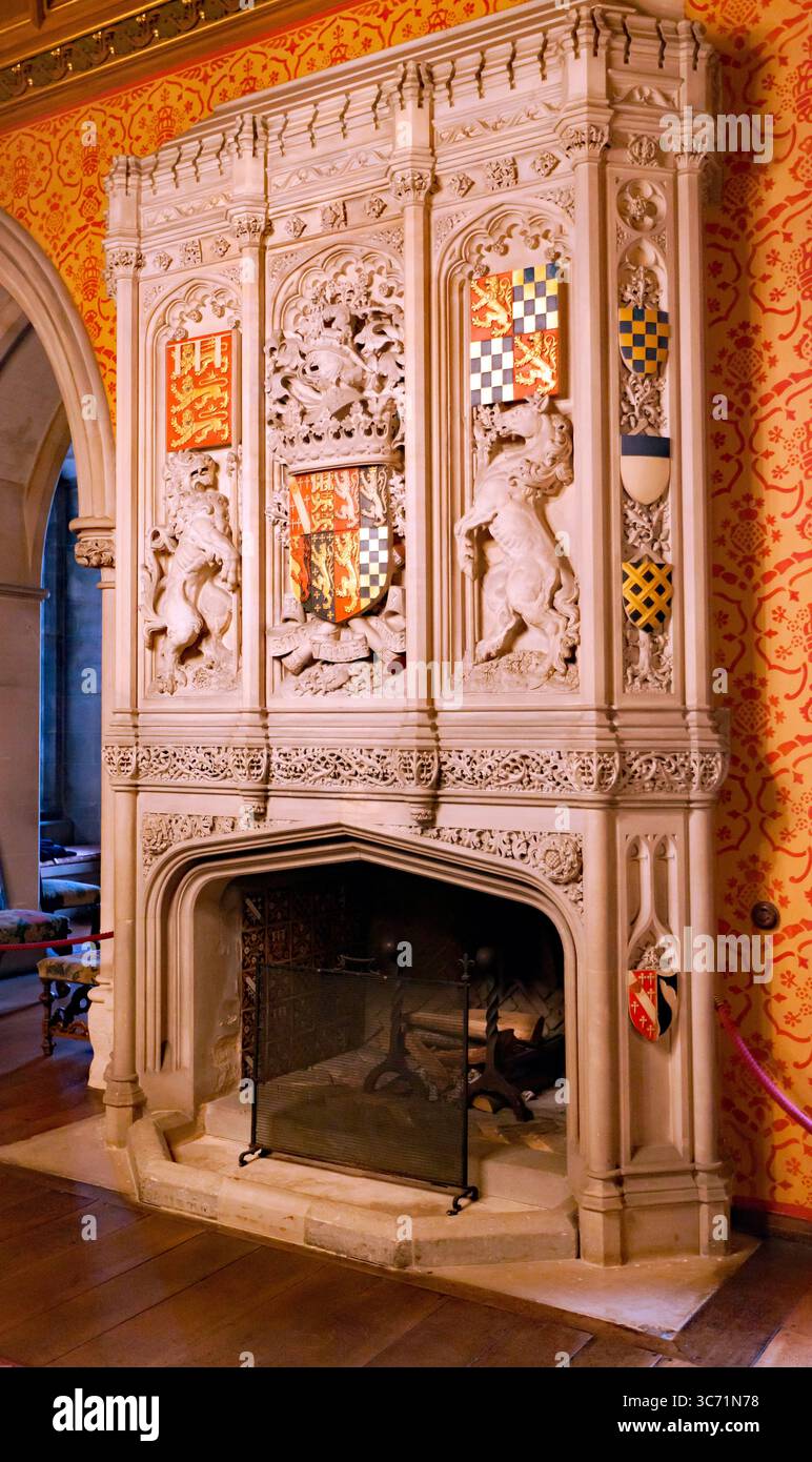 Heraldic decorations carved on an ornate Fireplace showing the arms of ...