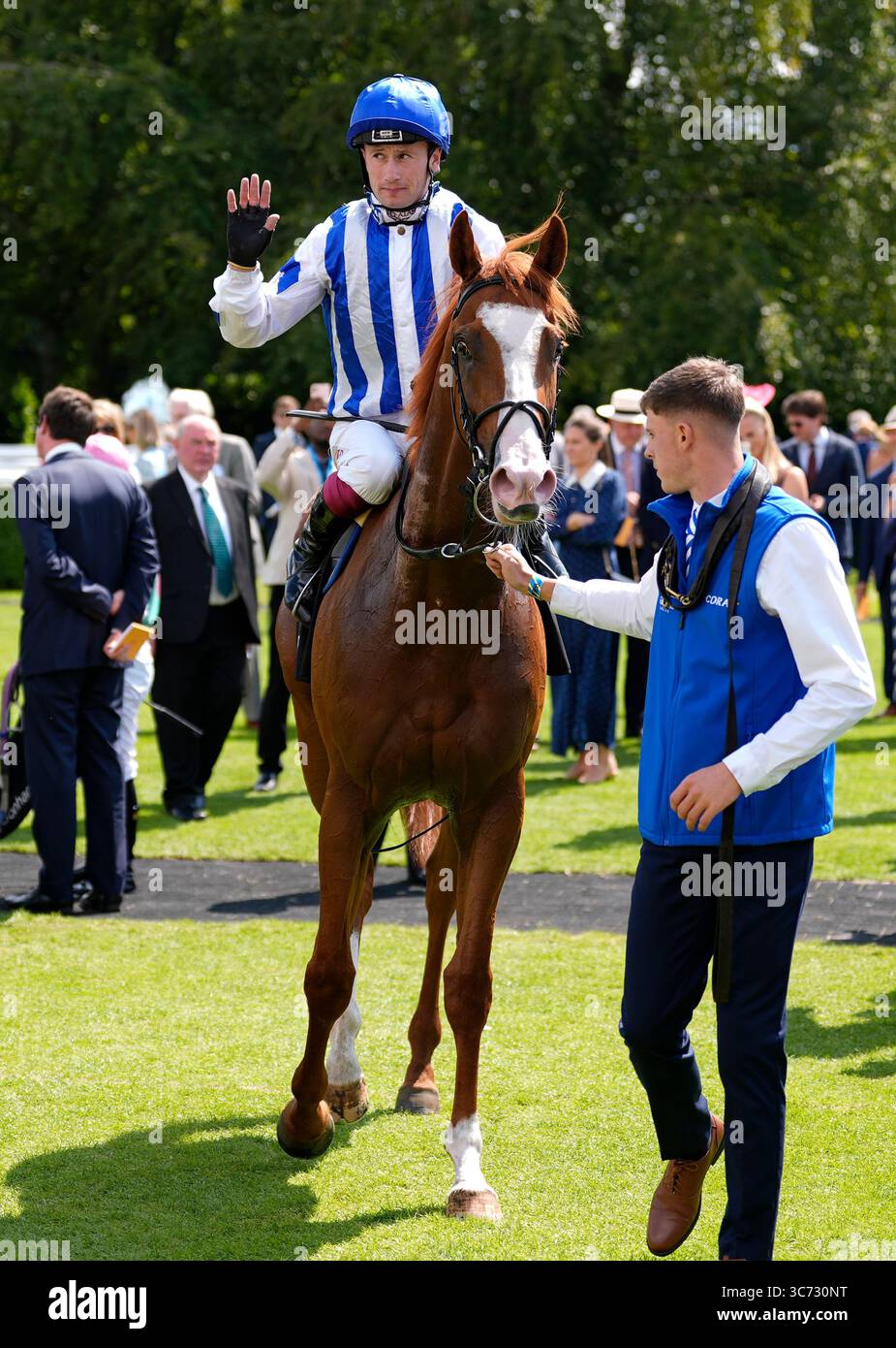 Jockey Oisin Murphy acknowledges the racegoers after wining the Bonhams ...
