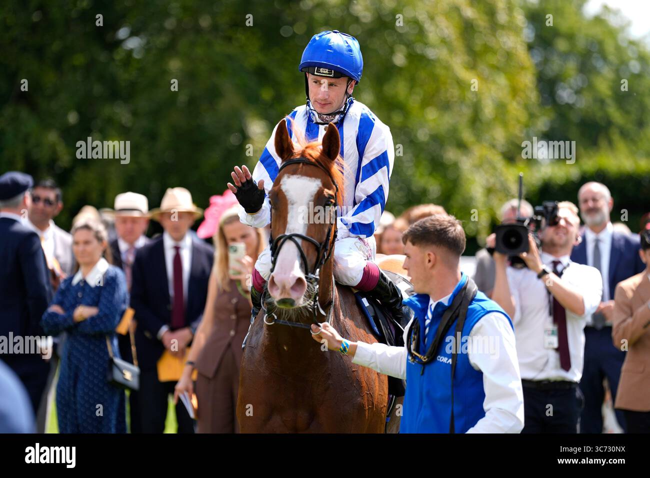 Jockey Oisin Murphy acknowledges the racegoers after wining the Bonhams ...
