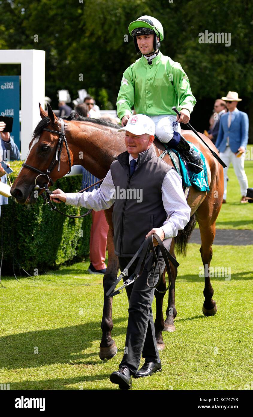 Jockey Jason Hart celebrates after winning the King George Qatar Stakes ...