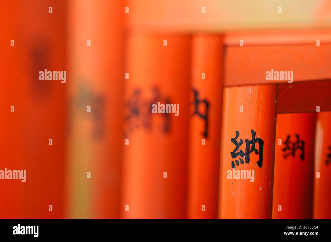Red Pillars with Japanese Script at Tokyo Shrine Stock Photo - Alamy