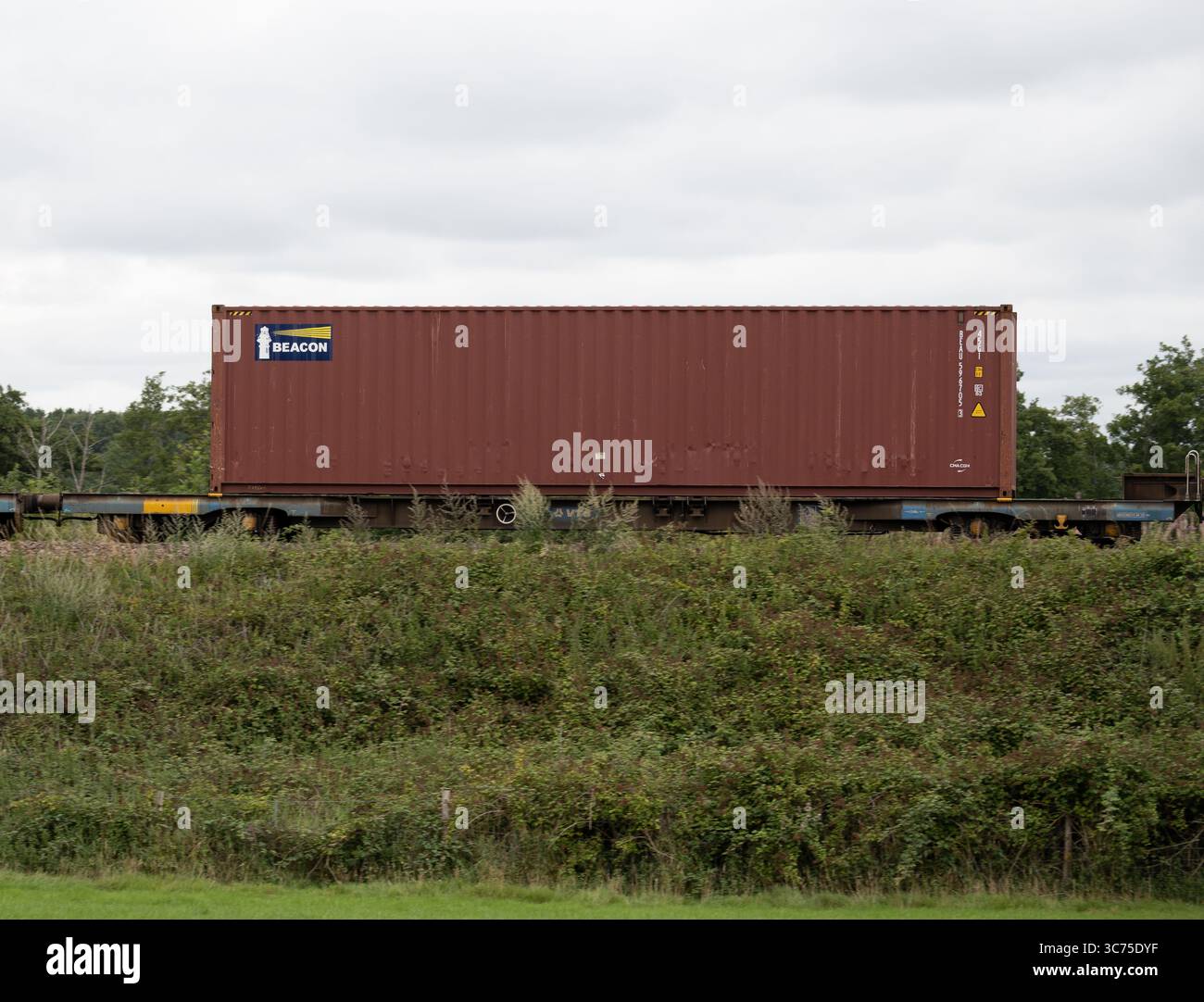 Beacon shipping container on a freightliner train, Warwickshire, UK ...