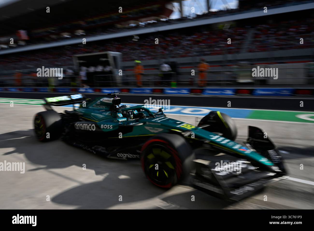 Aston Martin driver Lance Stroll of Canada steers his car on the pit ...