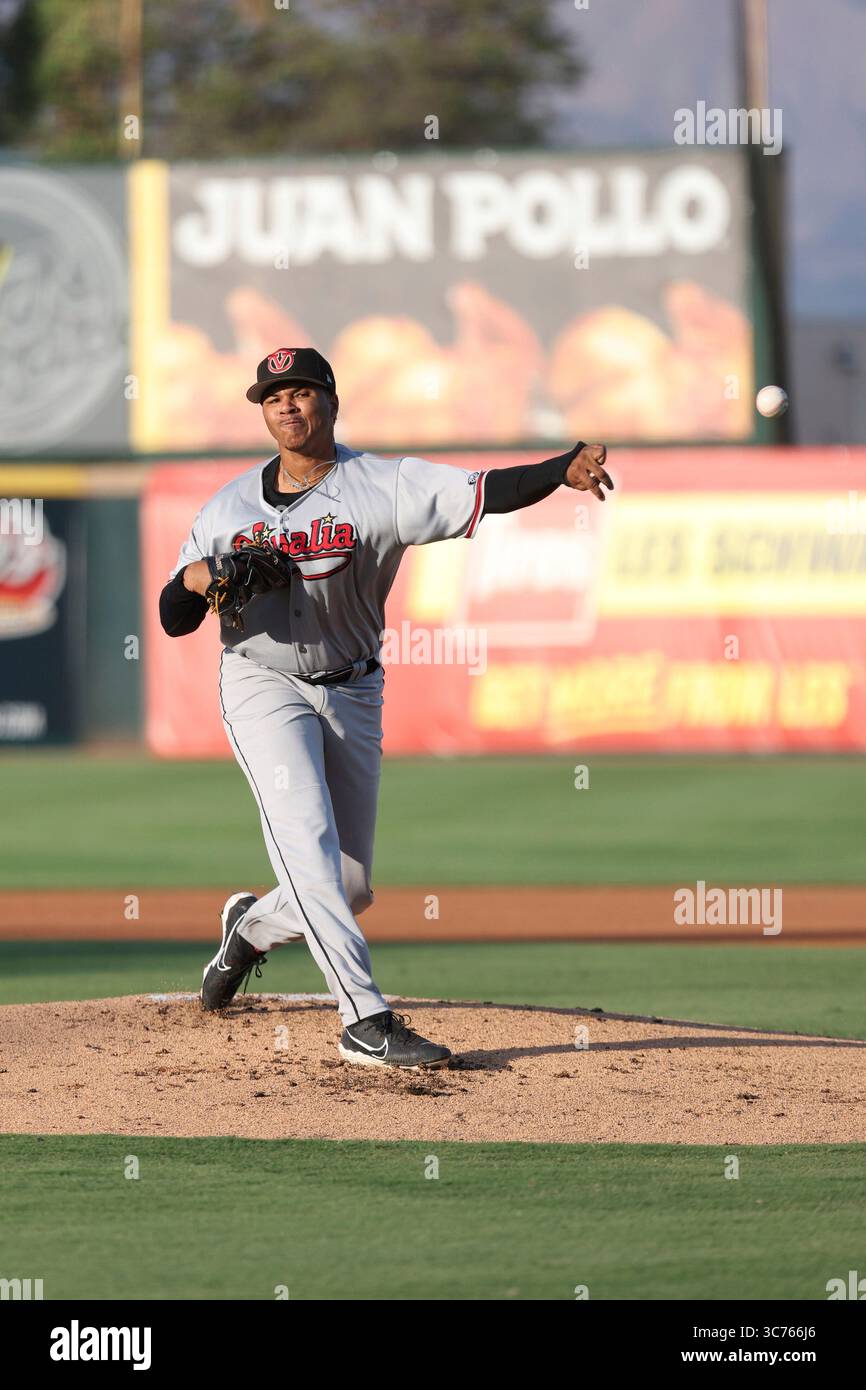 Adonys Perez (18) of the Visalia Rawhide pitches against the Inland ...