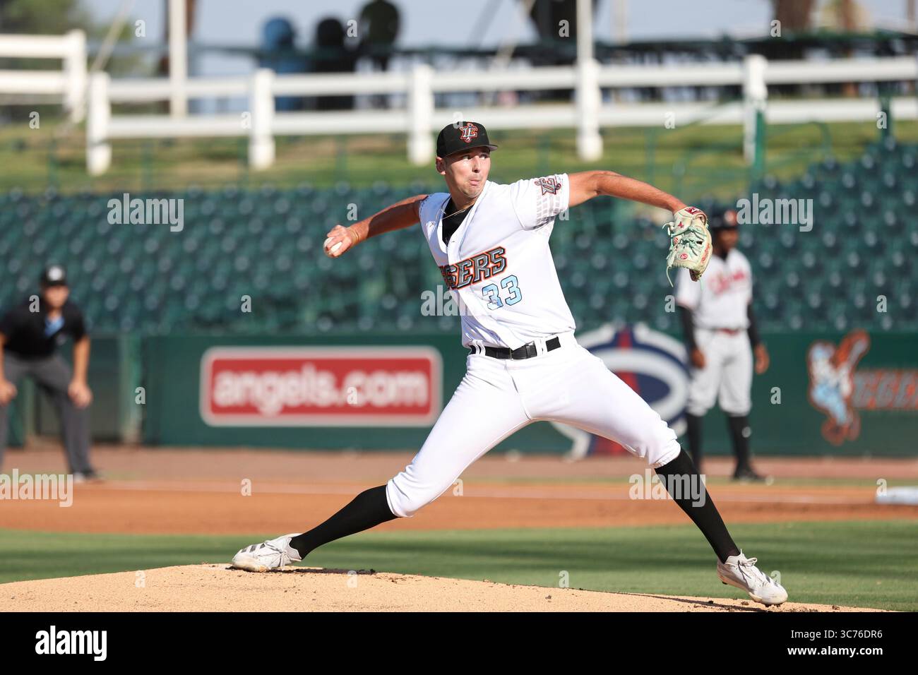 Peyton Olejnik (33) of the Inland Empire 66ers pitches against the ...