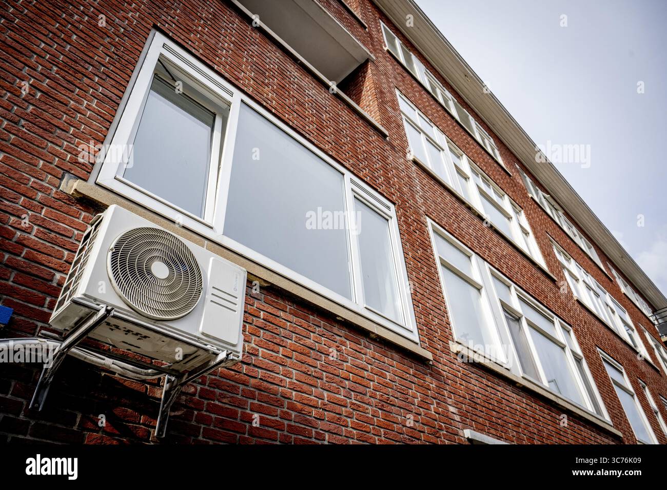 ROTTERDAM - An air conditioner on the outside of a home ANP /HOLLANDSE ...