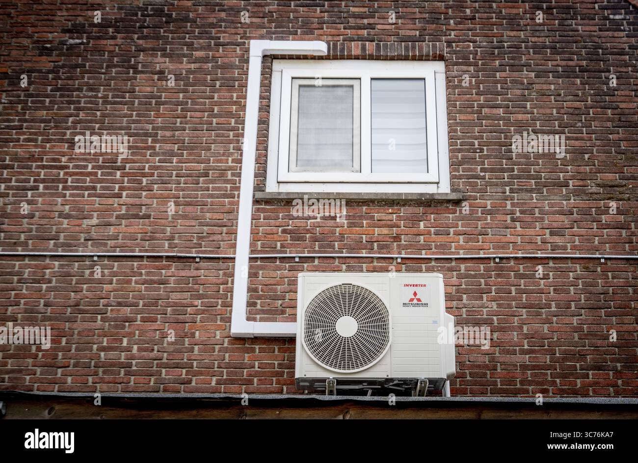 ROTTERDAM - An air conditioner on the outside of a home ANP /HOLLANDSE ...