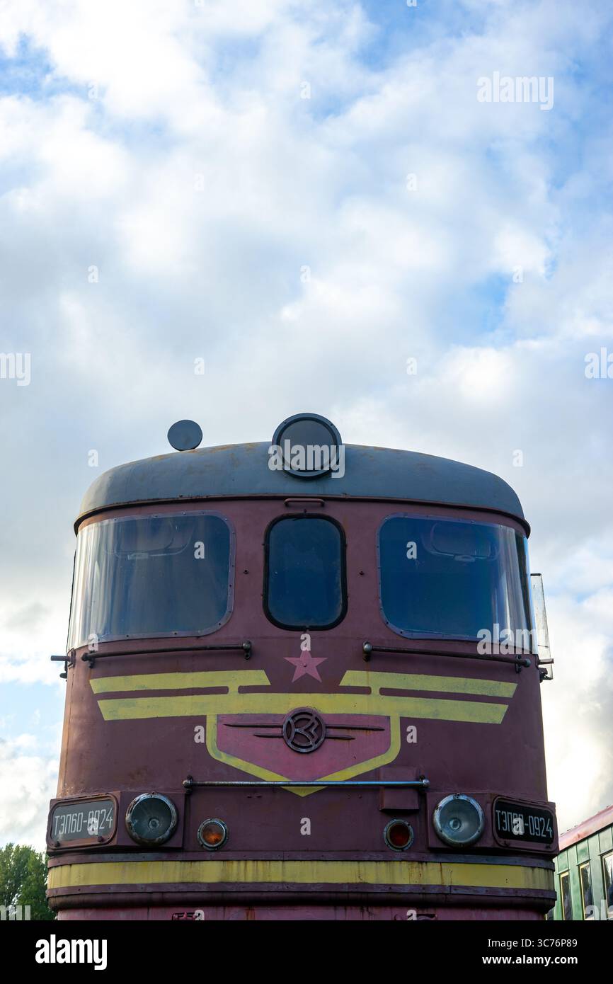 Vintage diesel locomotive with colorful purple and green livery at ...