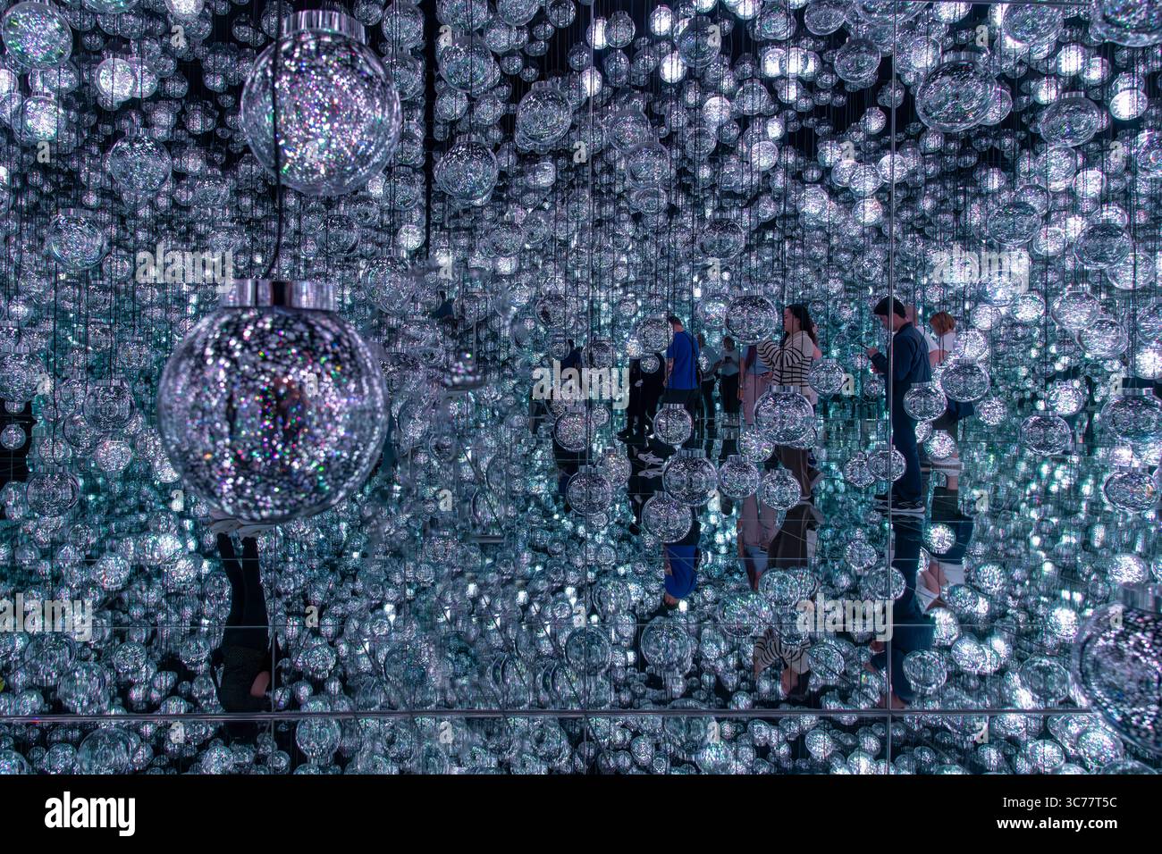 Tokyo, Japan - May 7, 2025: Interior view of a digital art installation ...