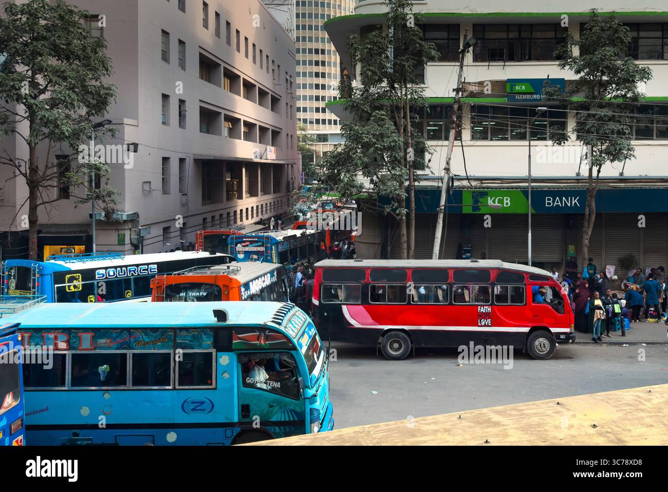 July 31st 2025 - View of brightly colored Public transport buses ...