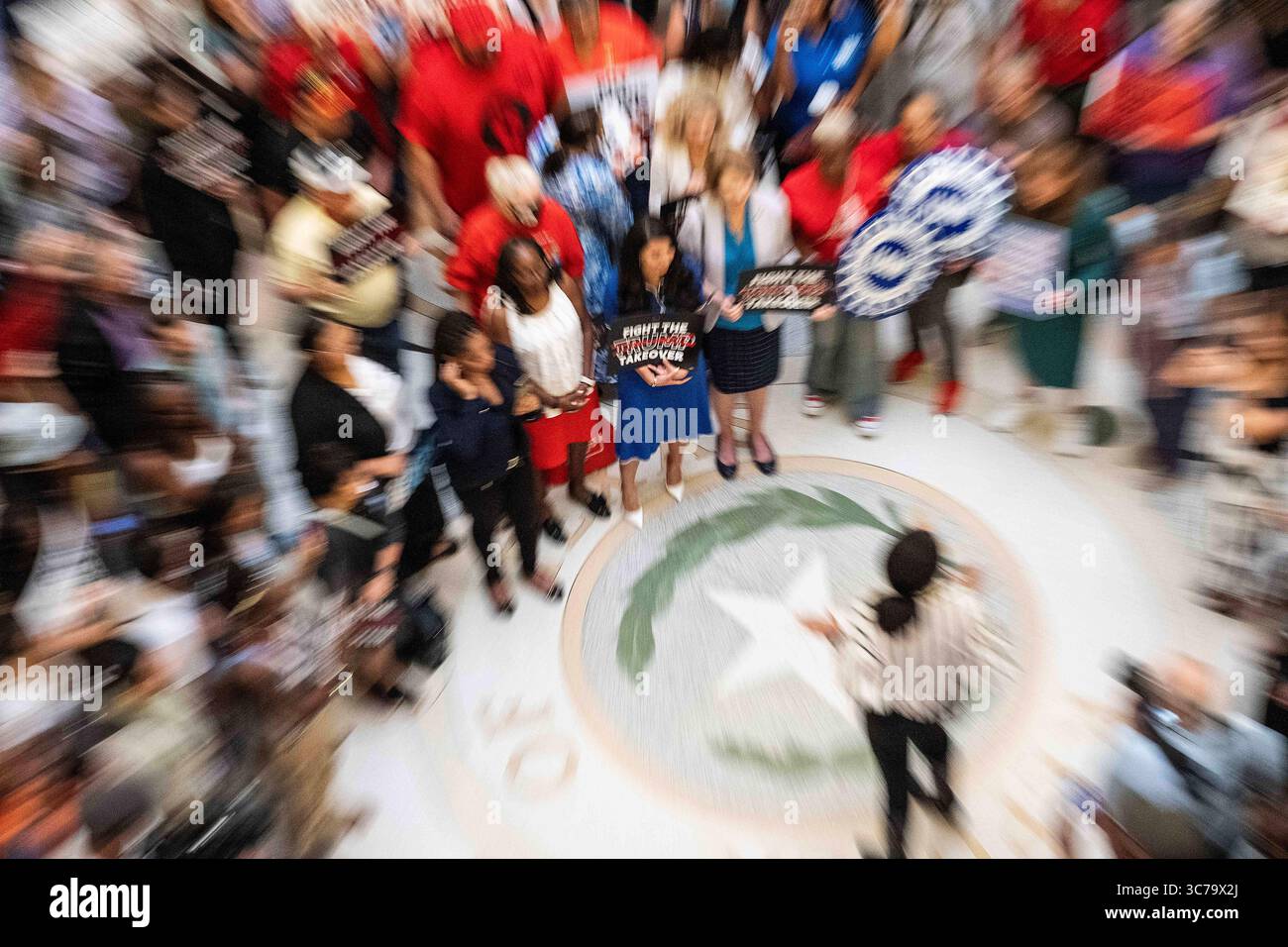 August 1, 2025: Individuals speaking in the Texas State Capitol rotunda ...