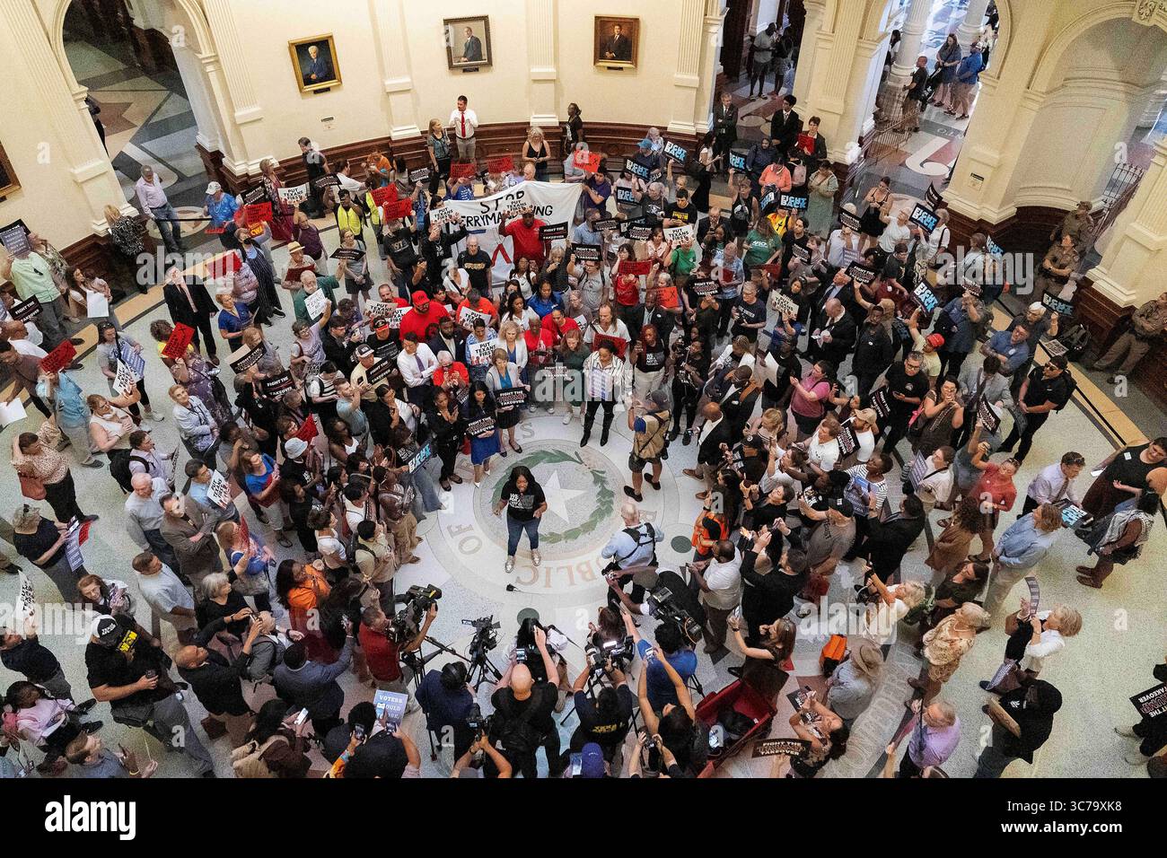 August 1, 2025: Individuals speaking in the Texas State Capitol rotunda ...