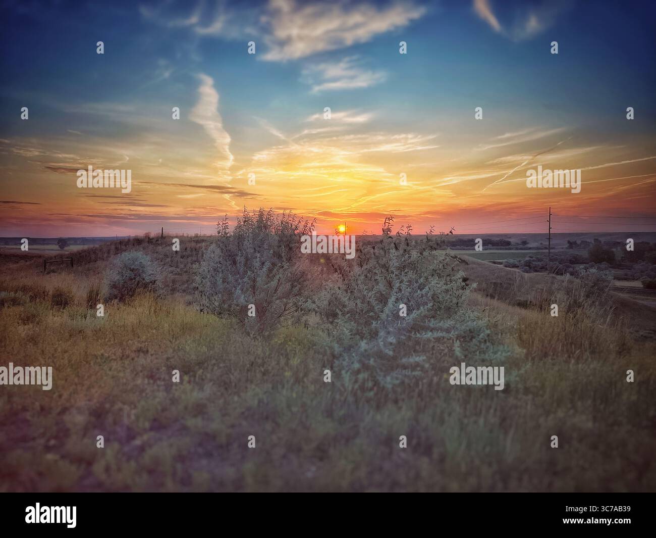 Wispy orange clouds sunset shot hi-res stock photography and images - Alamy