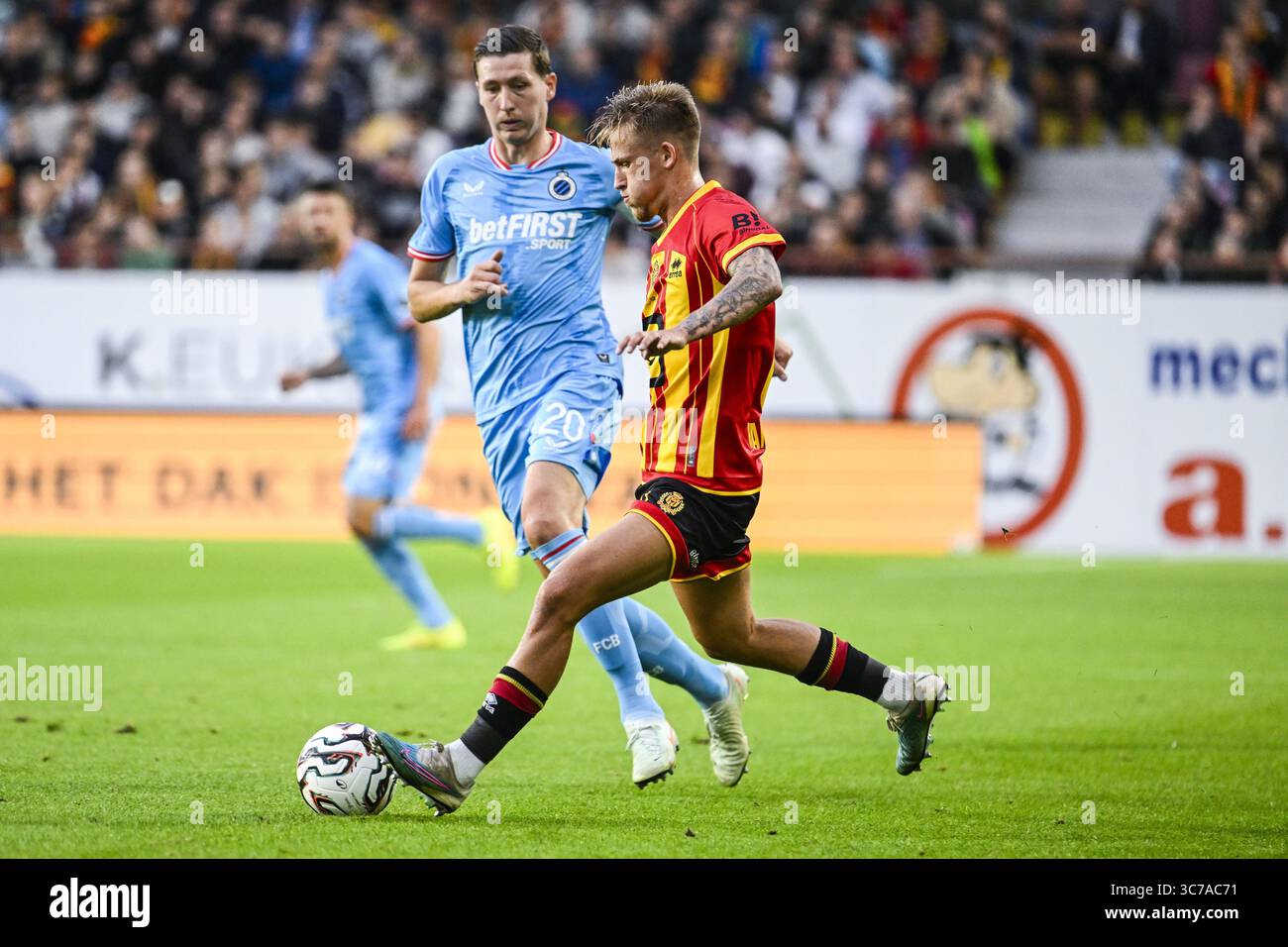 Mechelen, Belgium. 01st Aug, 2025. Club's Hans Vanaken and Mechelen's ...
