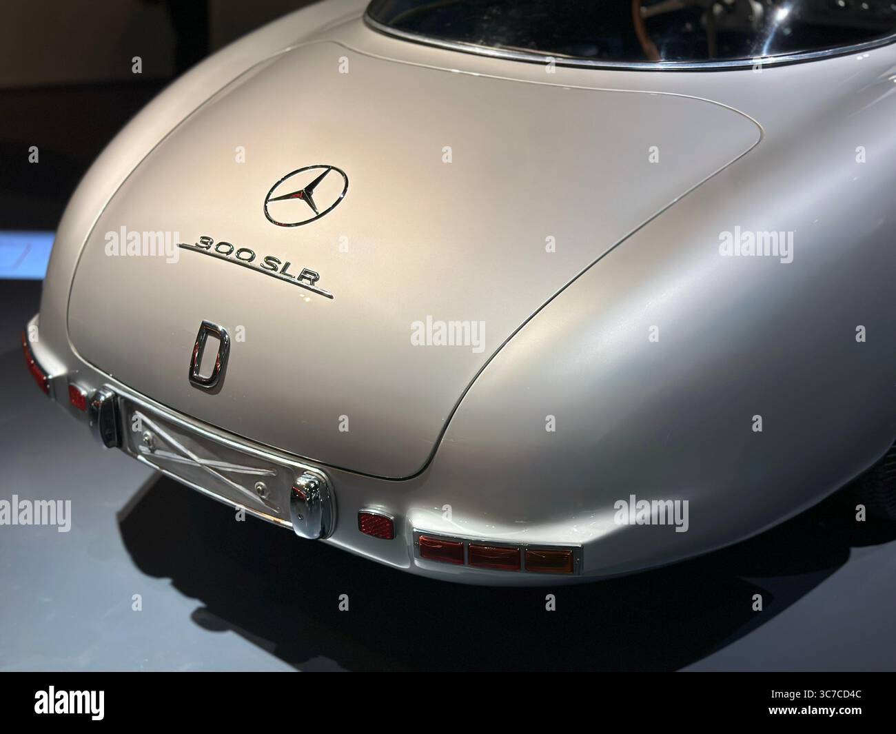 Rear view of a legendary silver Mercedes-Benz 300 SLR, showcasing the ...