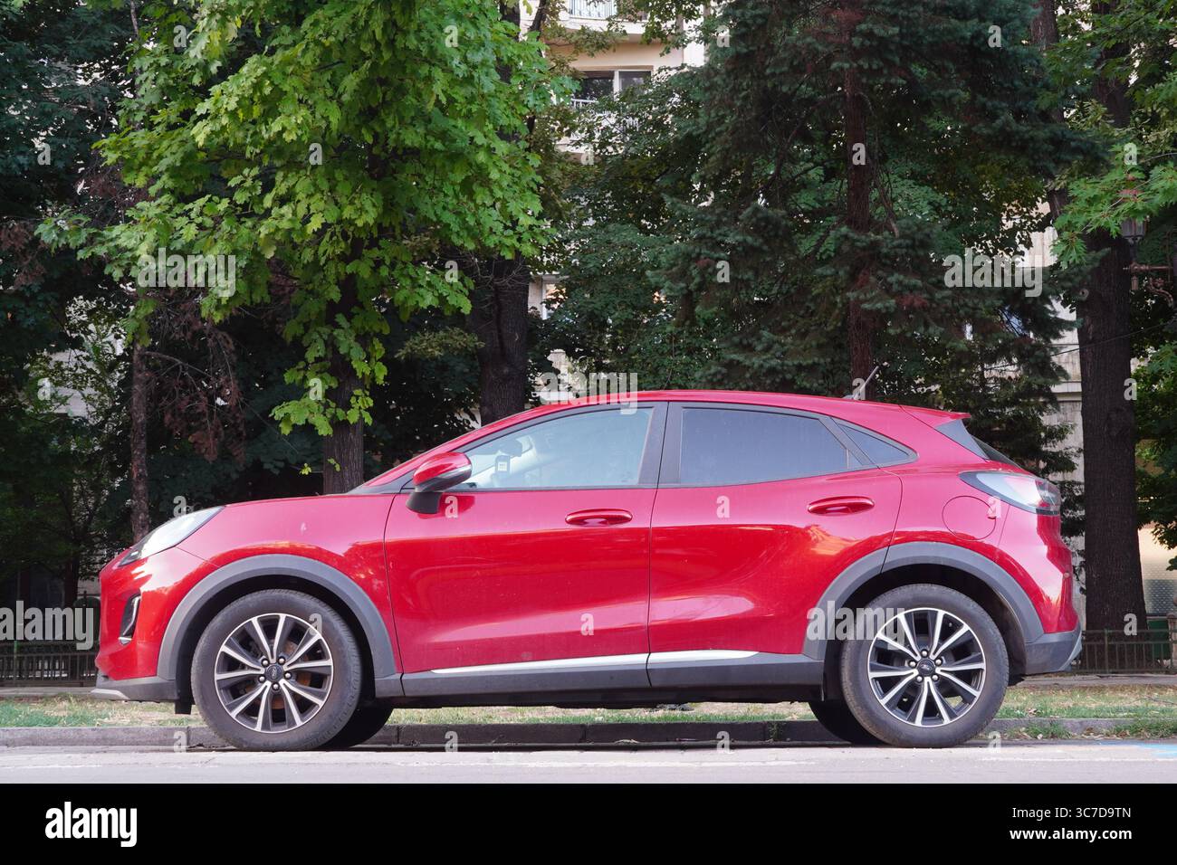Bucharest, Romania – August 1, 2025: Side view of Ford Puma red car ...