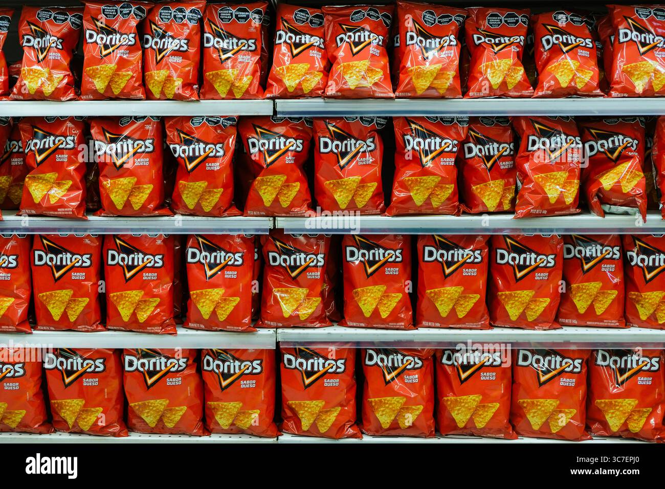 Full Shelf of Nacho Chips "Doritos" In The Supermarket Stock Photo - Alamy