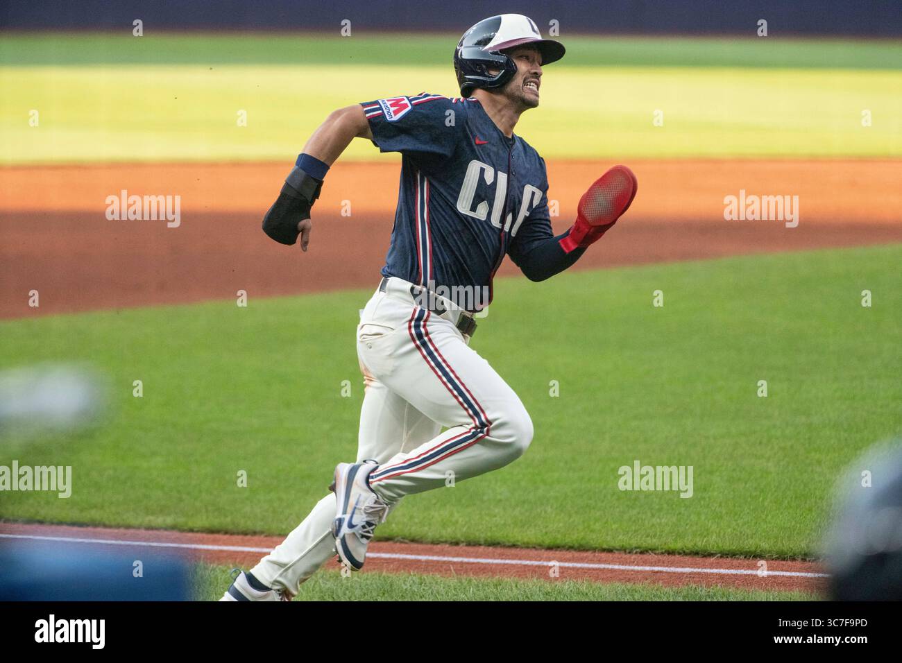 Cleveland Guardians' Steven Kwan heads for home plate on a single by ...