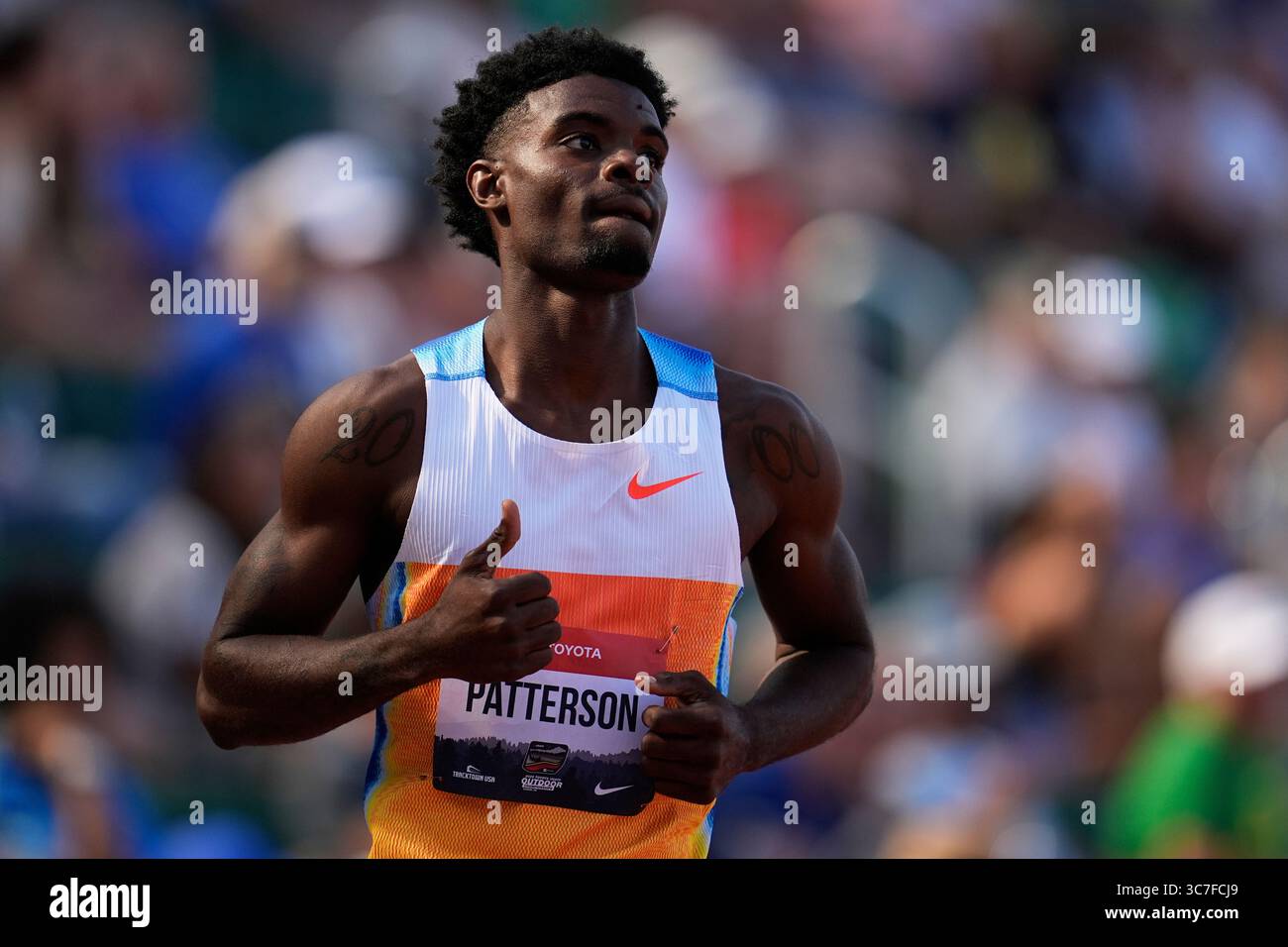 Jacory Patterson gestures after winning the second heat of the men's ...
