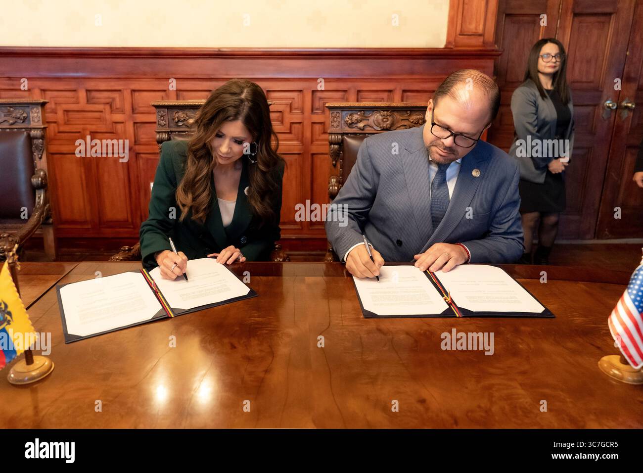 U.S. Department of Homeland Security (DHS) Secretary Kristi Noem signs ...