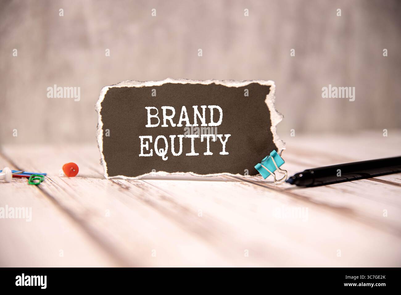 Strong Brand Equity symbol. Concept words Strong Brand Equity on wooden blocks. Beautiful grey ...