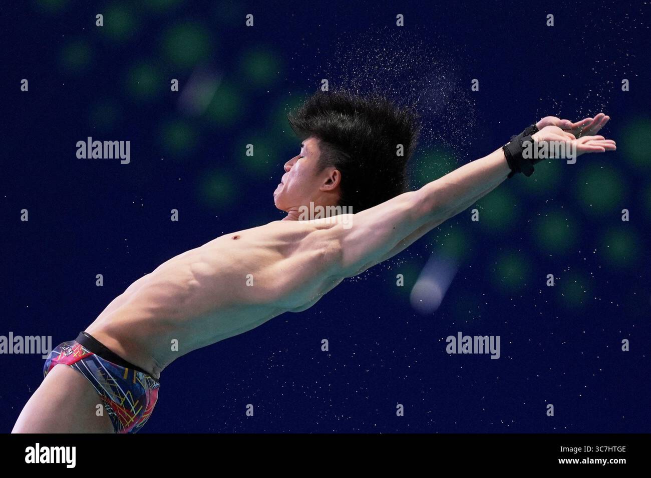 Rikuto Tamai of Japan competes in the men's 10m platform preliminaries ...