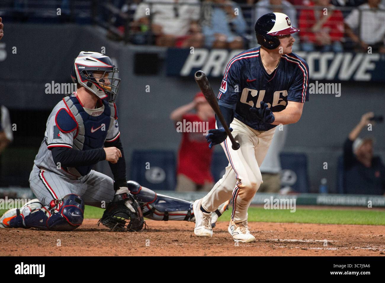 Cleveland Guardians' Kyle Manzardo, right, watches his winning RBI ...