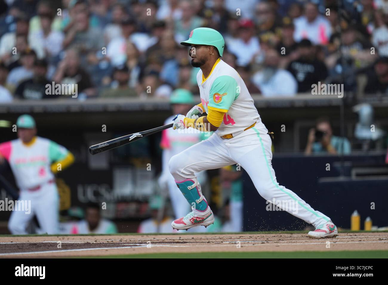 San Diego Padres' Luis Arraez watches his single during the first ...