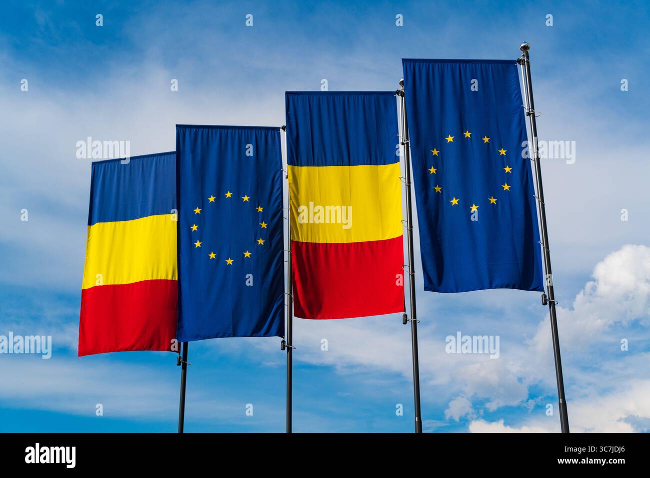 National flag of Romania and European flag in Cluj-Napoca, Romania ...